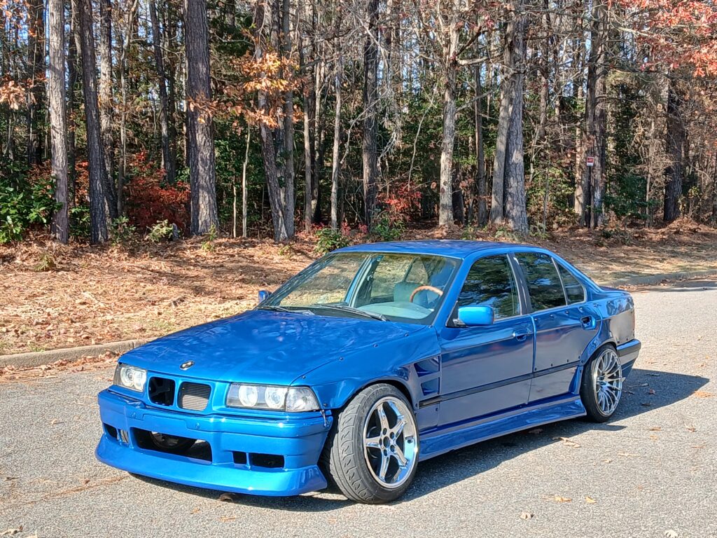 BMW e36 sedan’s wide body (fender flares/overfenders)